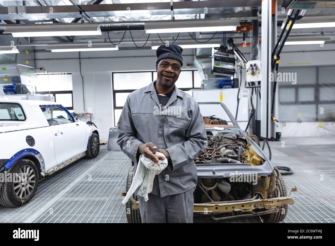 Portrait of a happy African American mechanic man Stock Photo - Alamy
