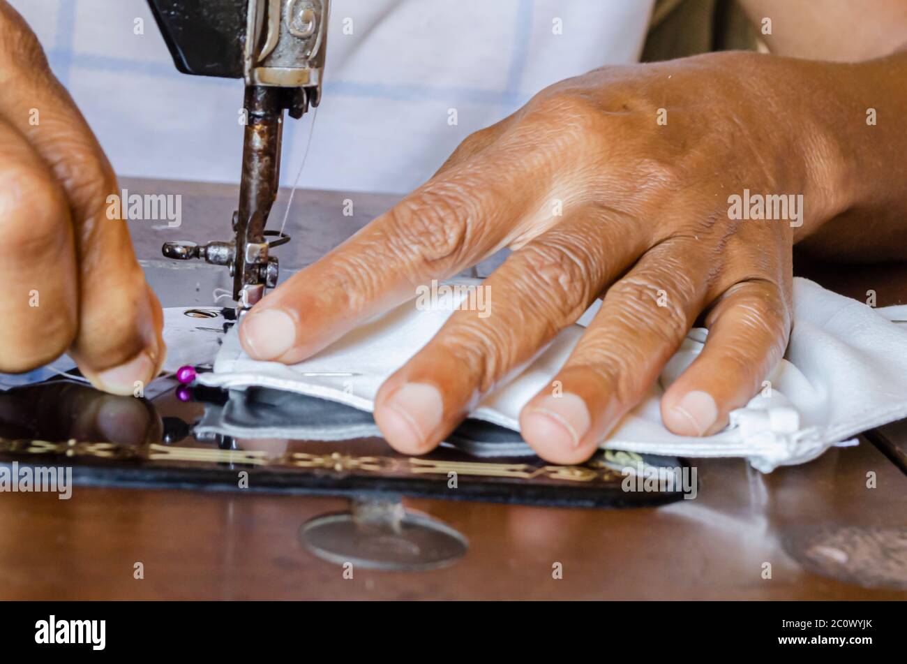 Guiding Material To Sew Stock Photo - Alamy
