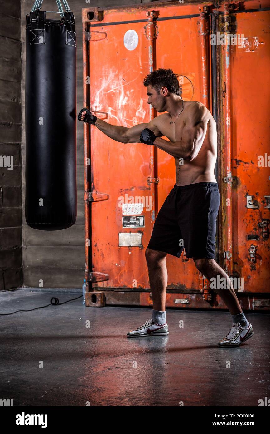 Young man boxing workout Stock Photo - Alamy