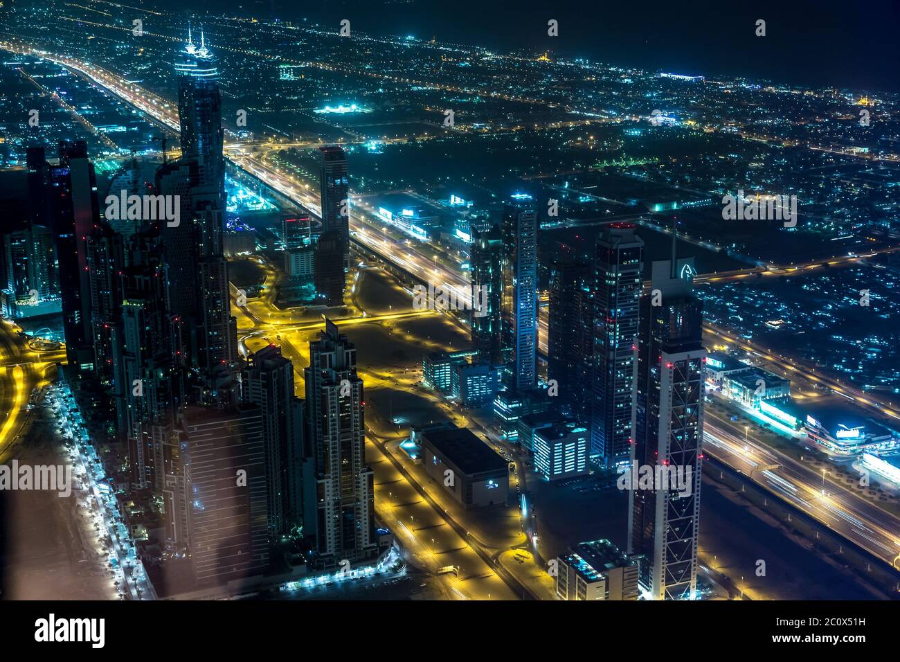 Dubai downtown night scene with city lights Stock Photo - Alamy
