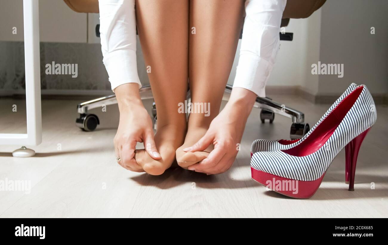 Woman Aching Feet High Resolution Stock Photography and Images - Alamy