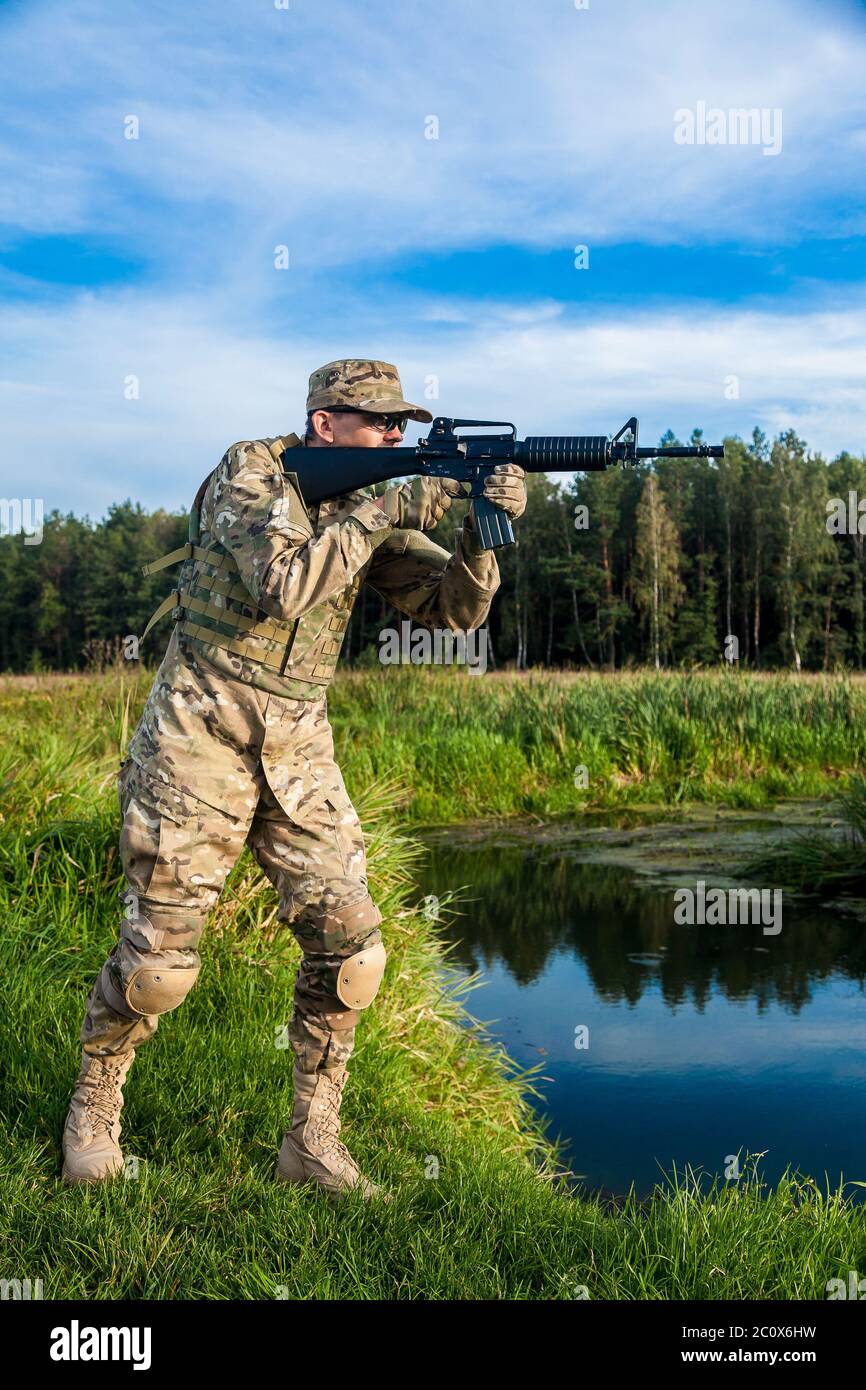 Soldier with a rifle Stock Photo - Alamy