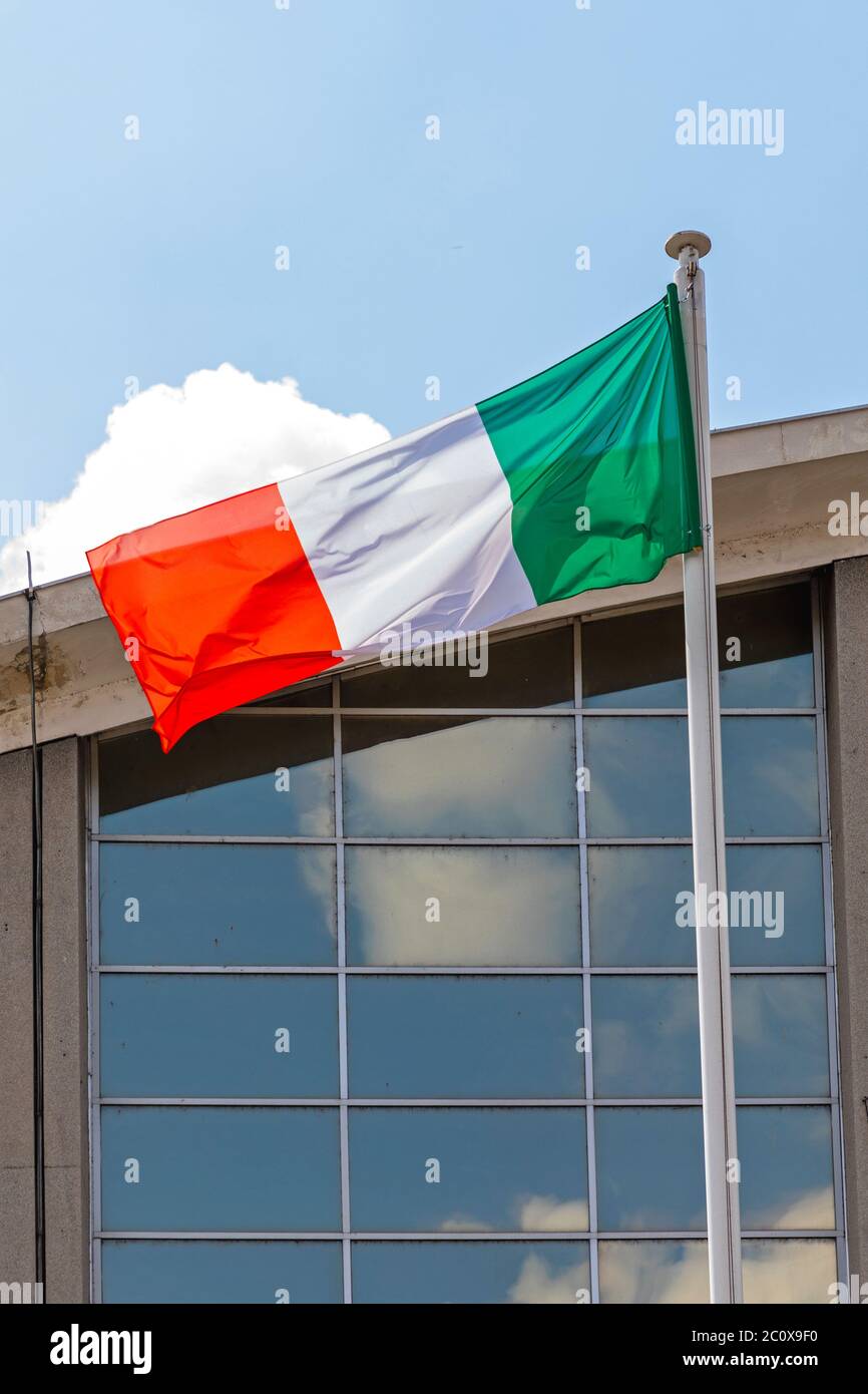 Italian National Flag Tricolor in Front of Building Stock Photo - Alamy