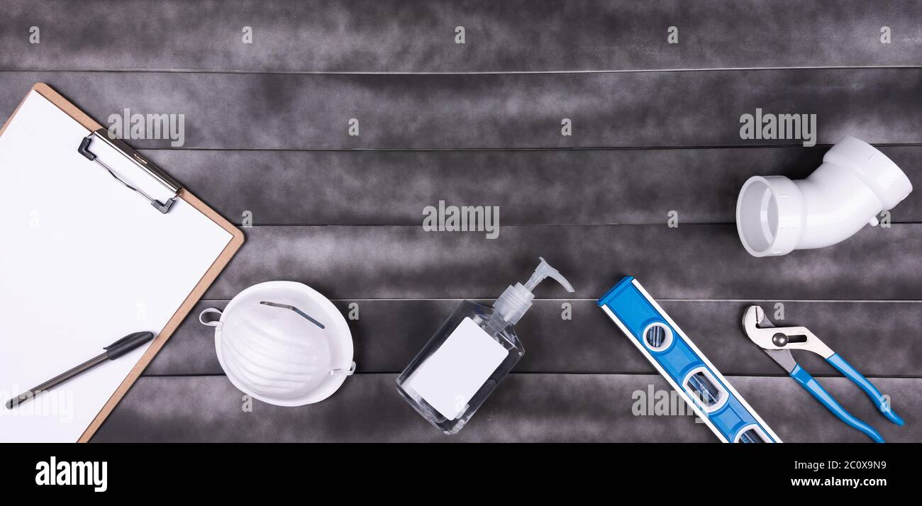 Plumber emergency and repair services. plumber pipe ,face mask, hands ...