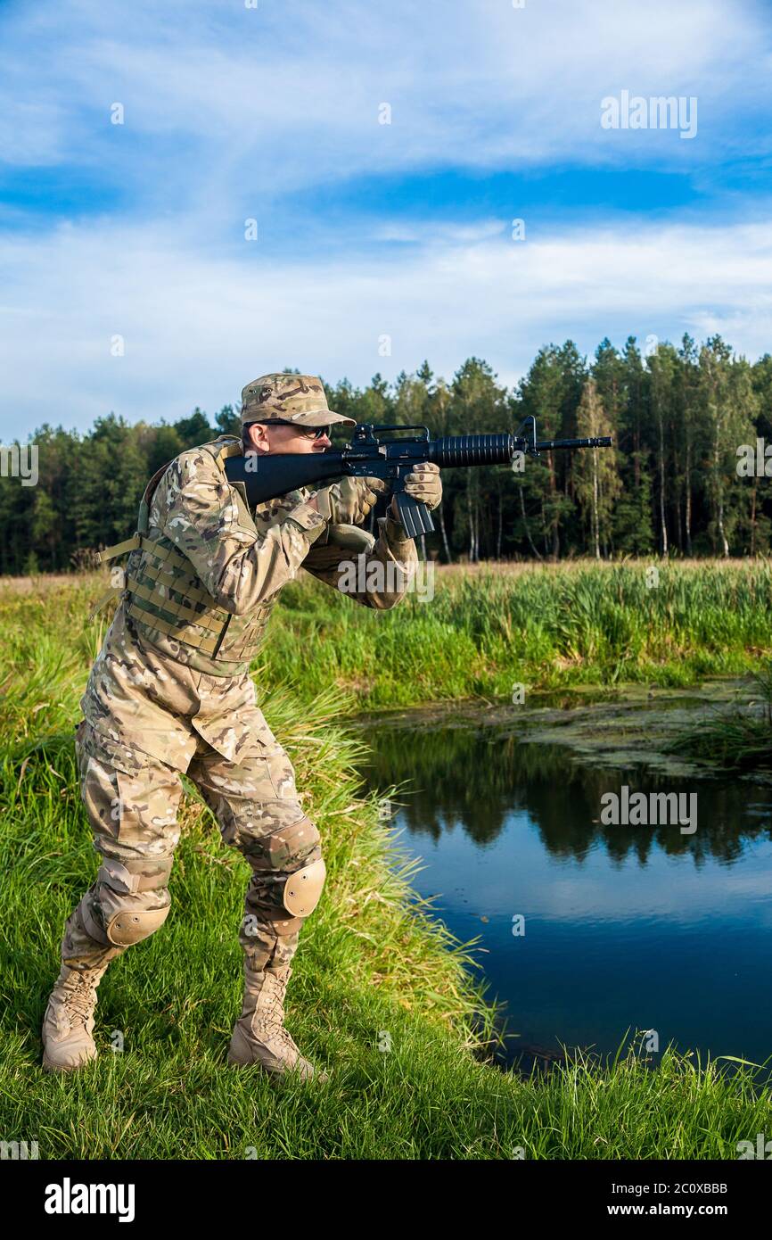 Soldier with a rifle Stock Photo - Alamy