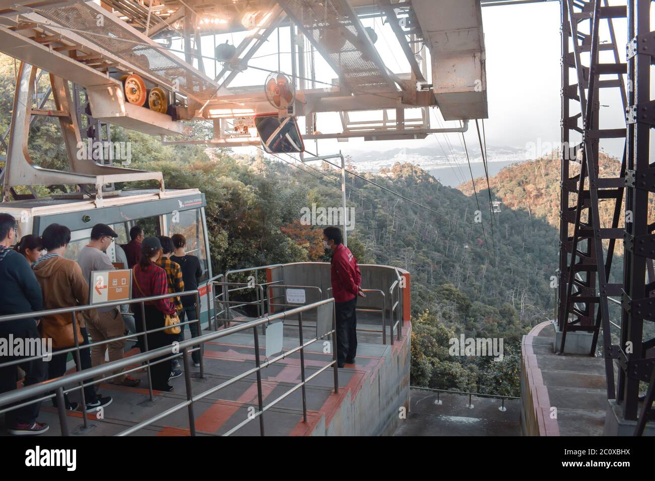 People waiting at ropeway leading to mount Misen at Miyajima island in ...