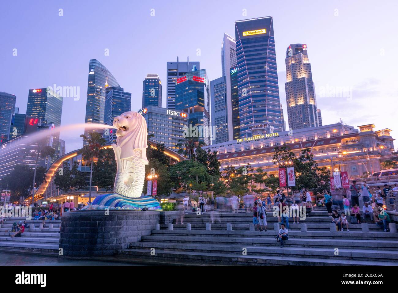 Night view of Merlion Park with Merlion fountain and downtown financial ...