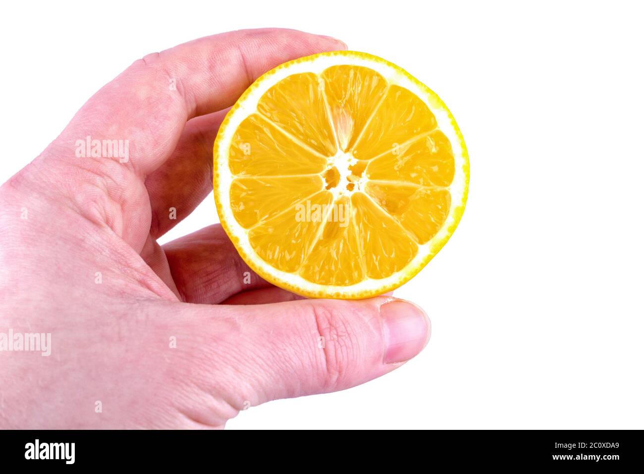 Hand with lemon on a white background Stock Photo - Alamy