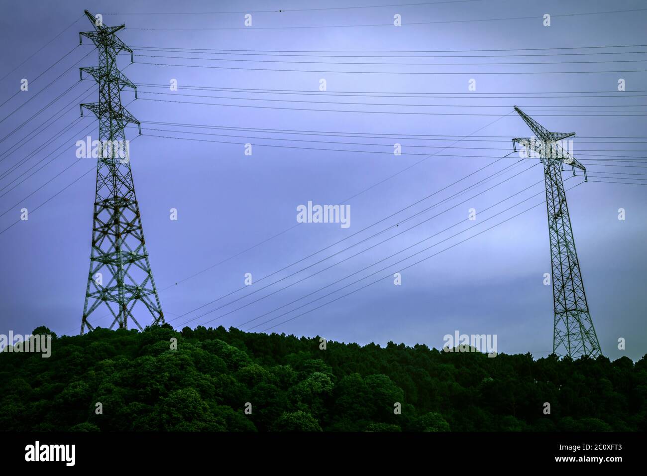 the city's main power lines on the huge metal towers. dramatic ...