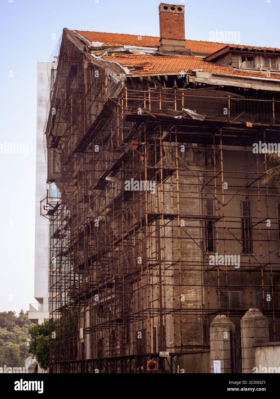 a huge old building under reconstruction, restoration or rebuilding ...