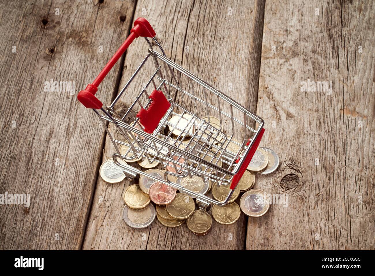 Shopping trolley coins on hi-res stock photography and images - Alamy