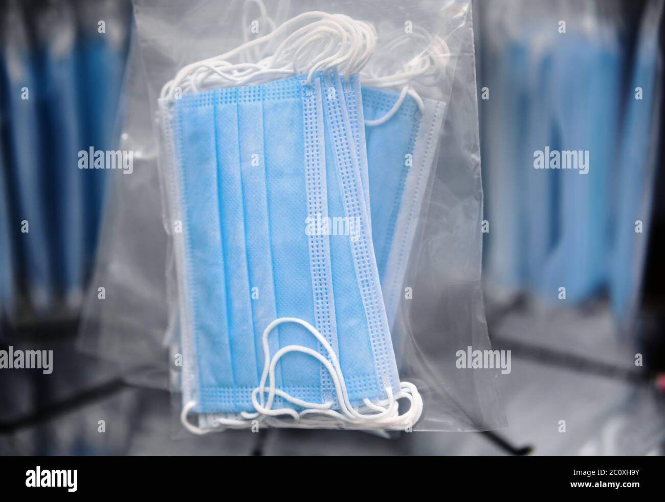 Surgical masks on retail stand display shop store sale Stock Photo - Alamy
