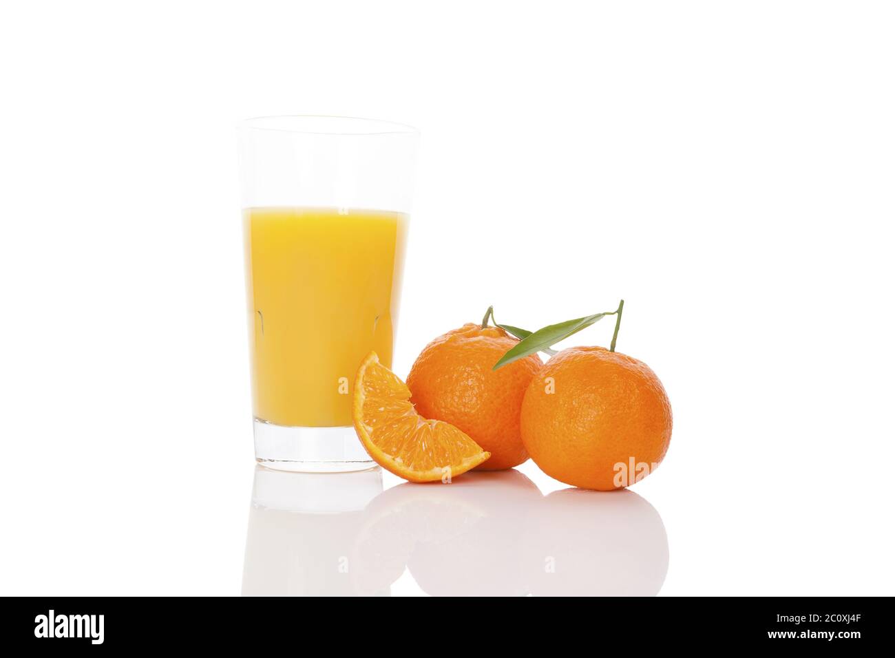 Fresh mandarin juice Stock Photo - Alamy