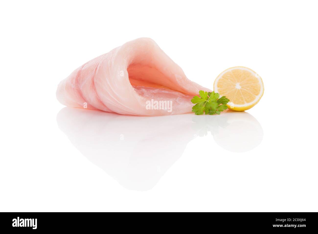 Fresh raw fish fillet isolated Stock Photo - Alamy