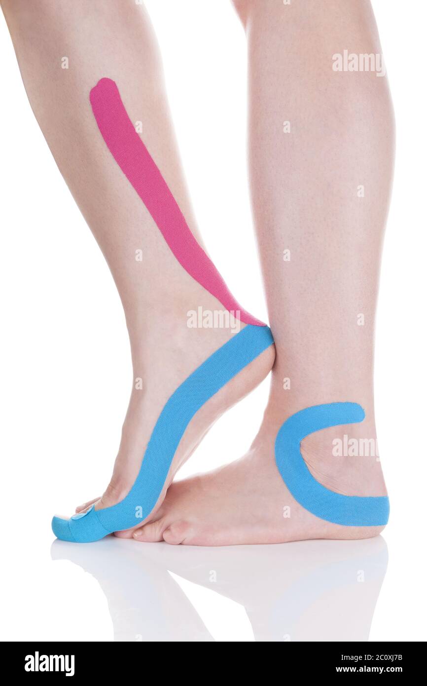 Kinesio tape on female leg Stock Photo - Alamy