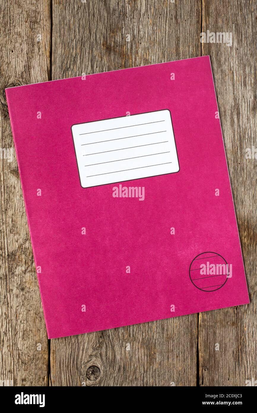 Red exercise book Stock Photo - Alamy