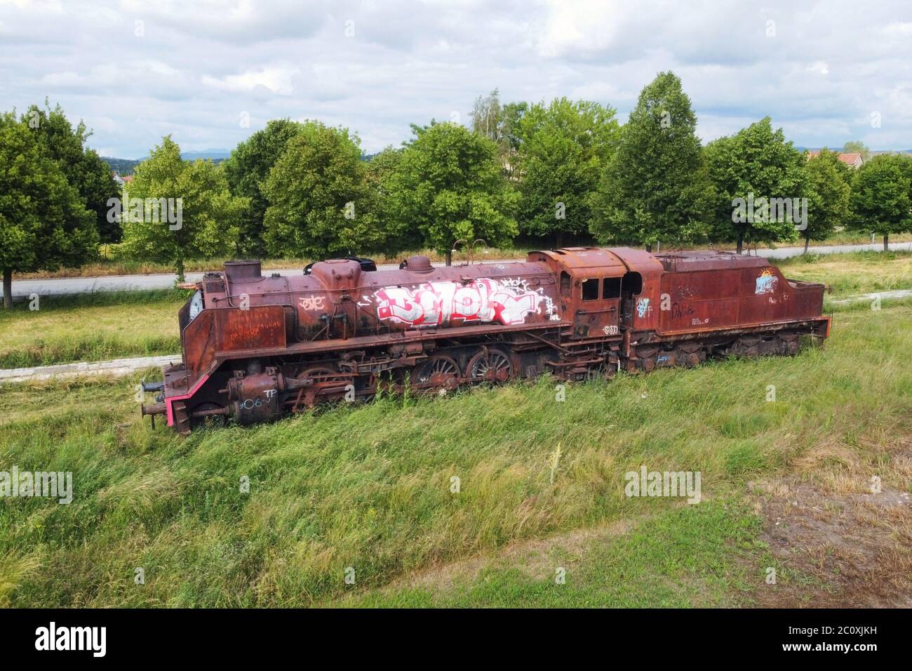Old train cemetery. Aerial view of an old abandoned rusty steam train ...