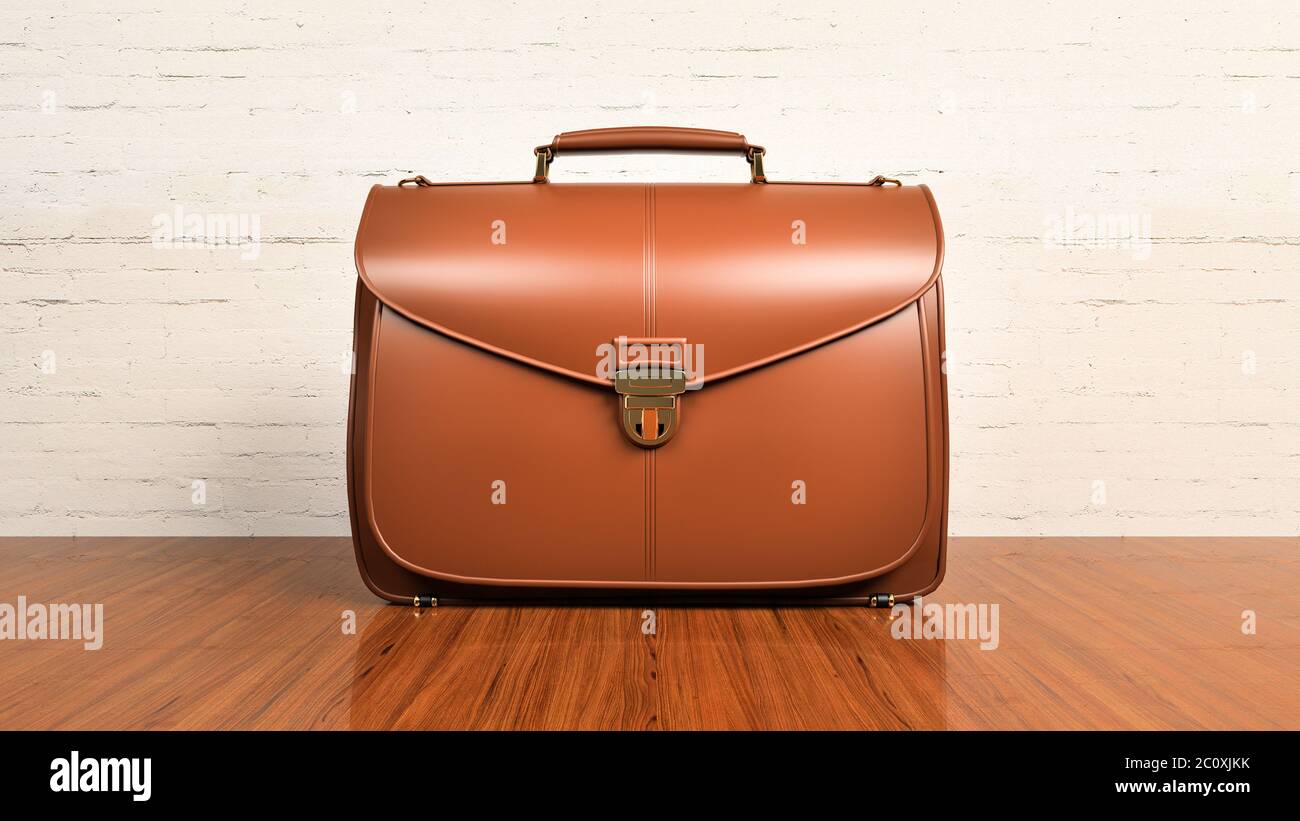 Office desk table with briefcase Stock Photo - Alamy