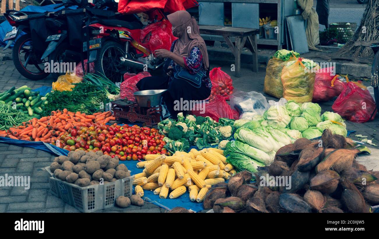 Trade in a traditional market. There are various kinds of local ...