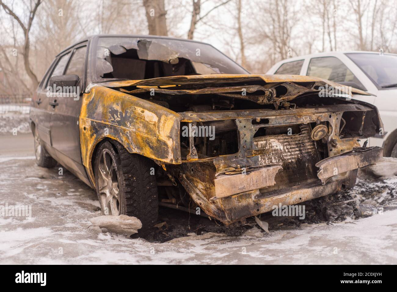 Burned car after arson Stock Photo - Alamy