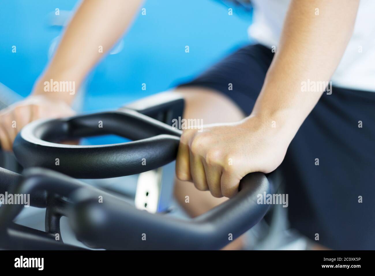 young man working out in modern gym Stock Photo - Alamy