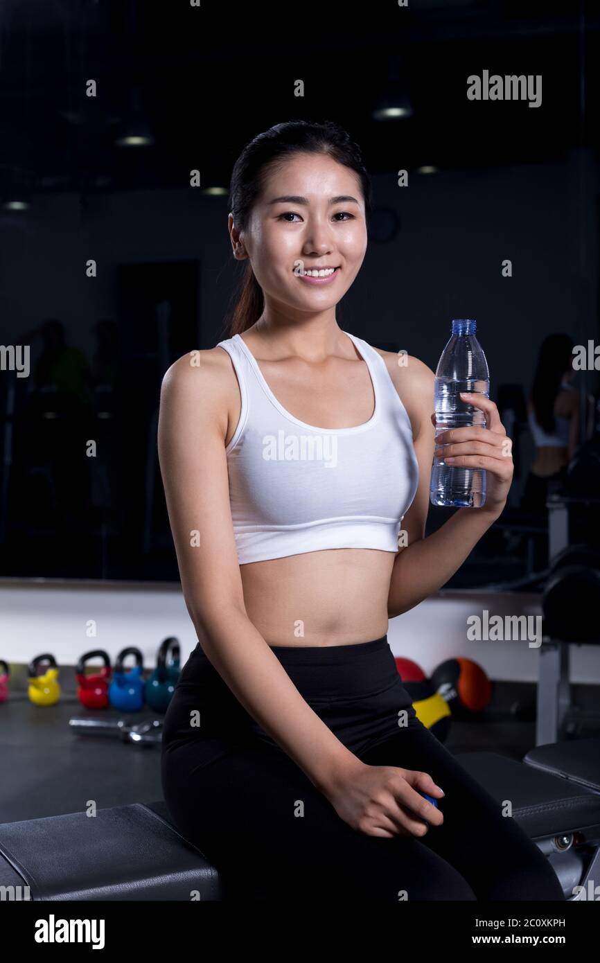 beautiful girl working out in moder gym Stock Photo - Alamy