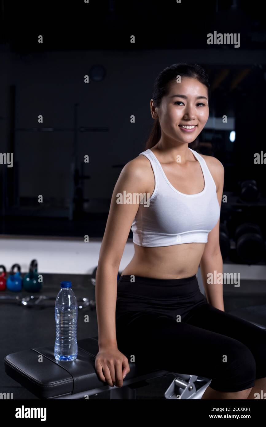 beautiful girl working out in moder gym Stock Photo - Alamy