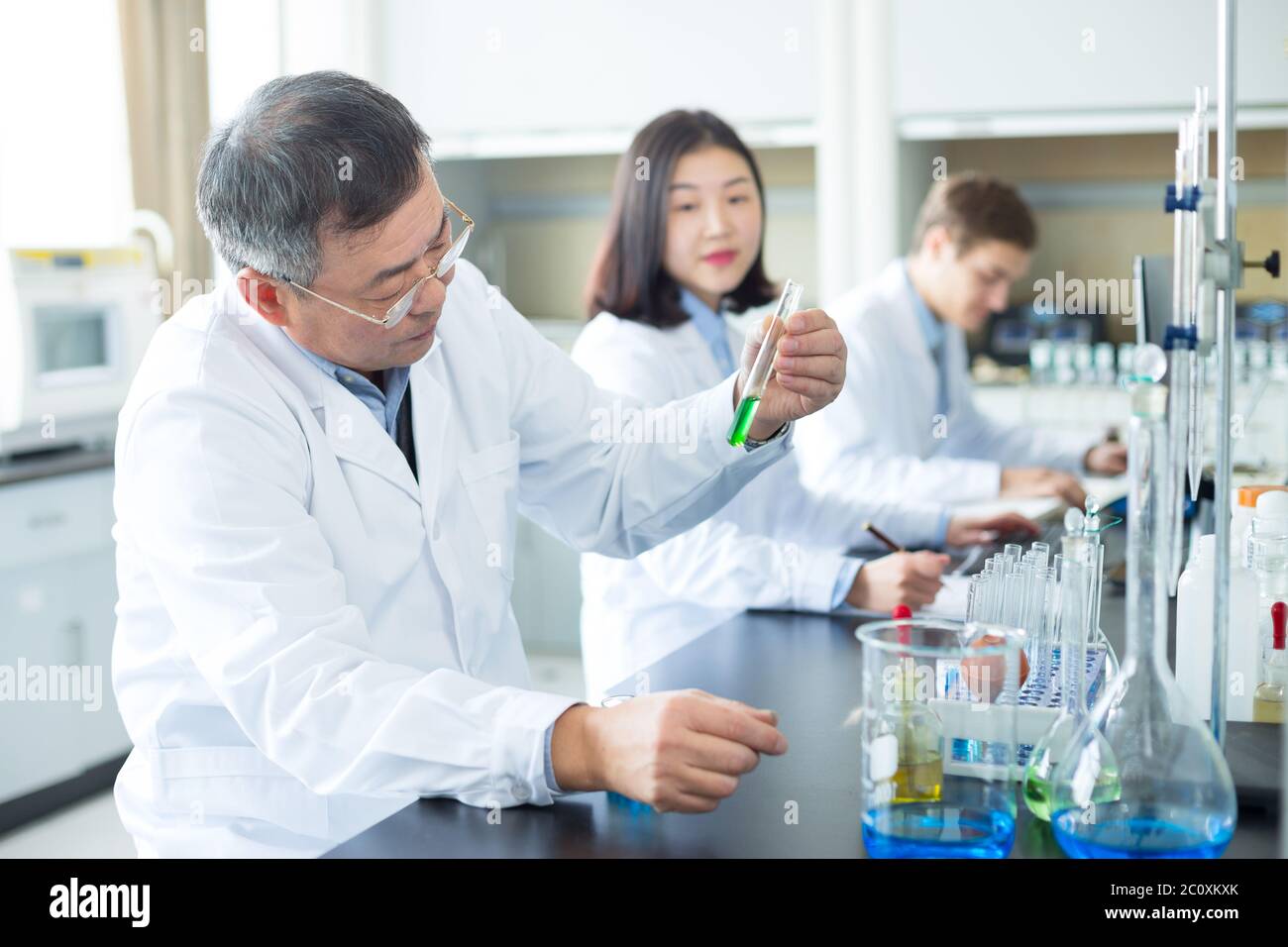 Modern coat hi-res stock photography and images - Alamy