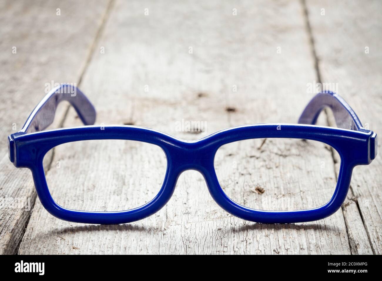 Blue plastic glasses Stock Photo - Alamy