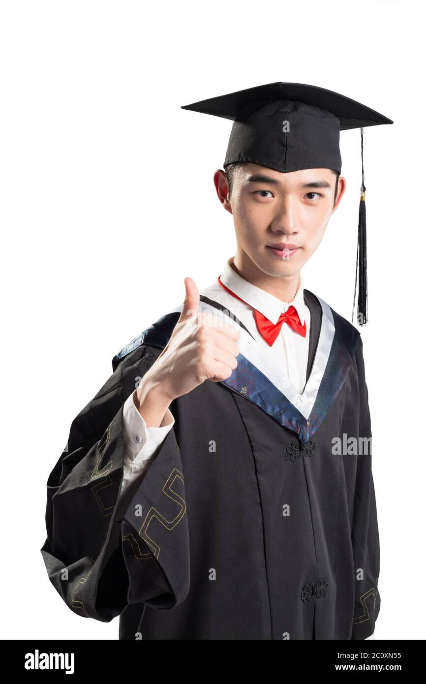 isolated asian young man with education gown Stock Photo - Alamy