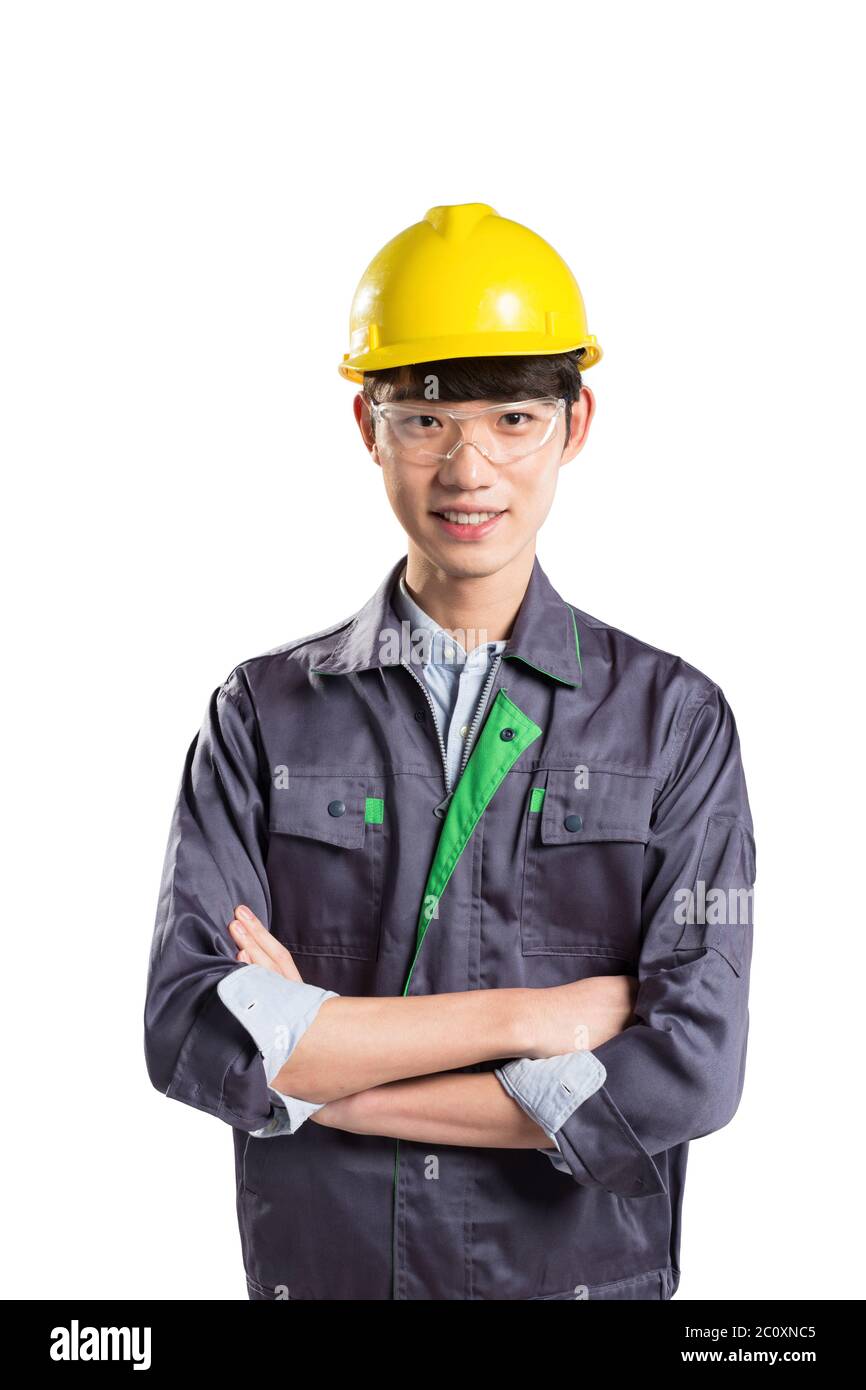 young handsome asian technician on white background Stock Photo - Alamy