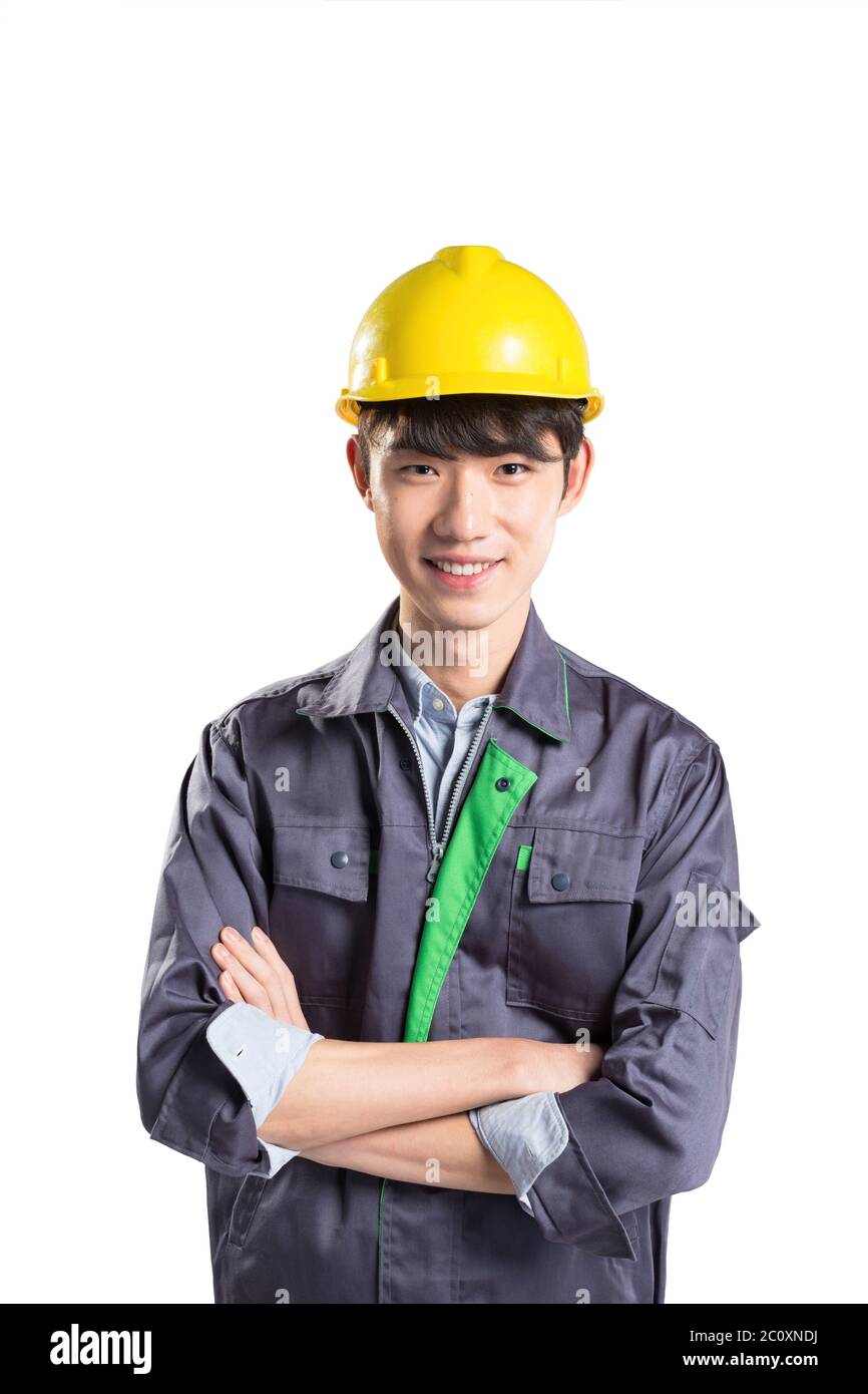 isolated young handsome asian technician on white background Stock ...