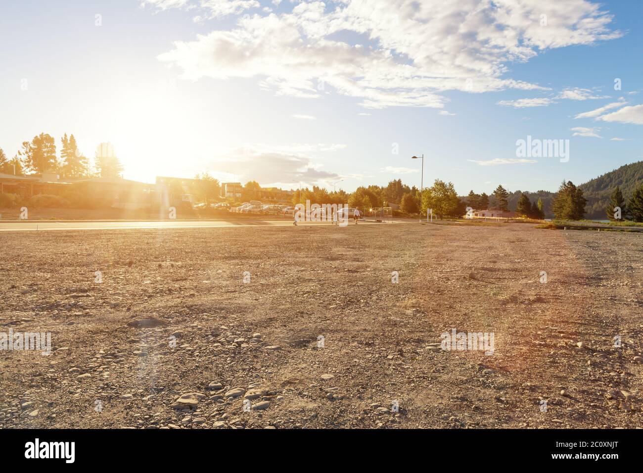 empty ground near lake in summer d day in New Zealand Stock Photo - Alamy