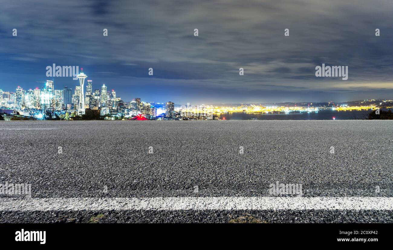 asphalt road with cityscape of seattle at night Stock Photo - Alamy