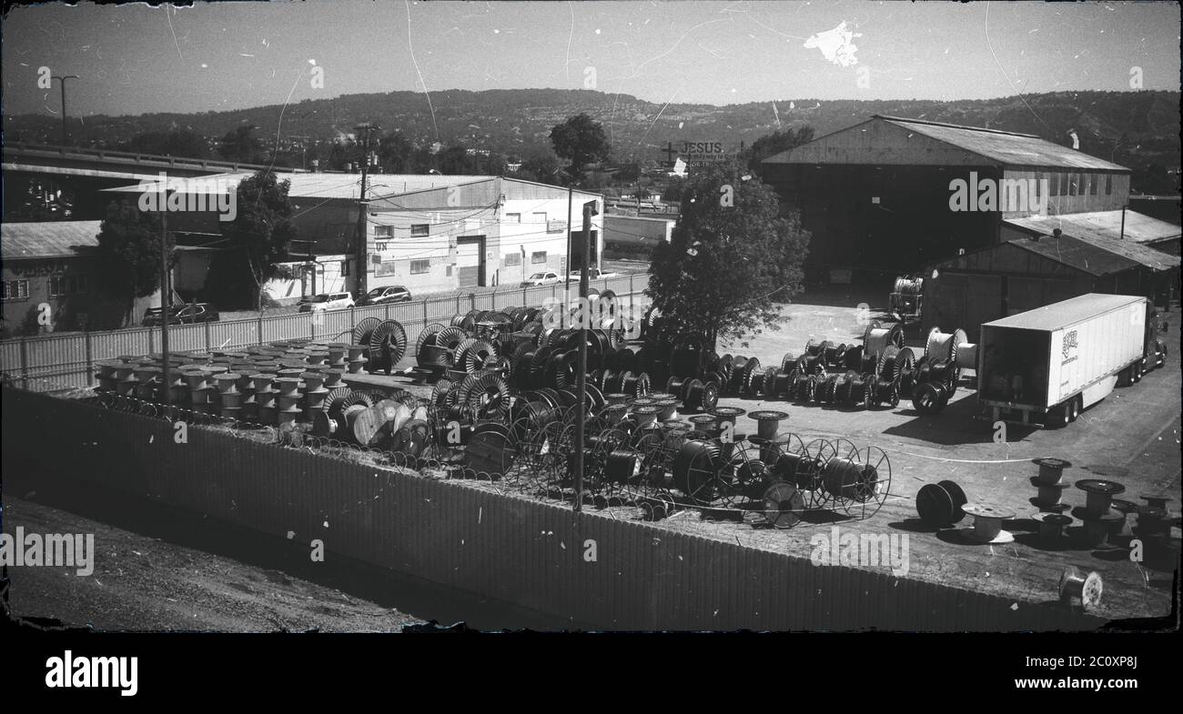 Views of a wire spool warehouse yard Stock Photo - Alamy