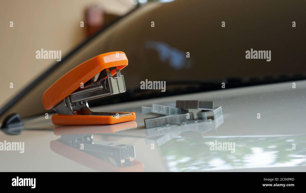 Close up the stapler on the table Stock Photo - Alamy