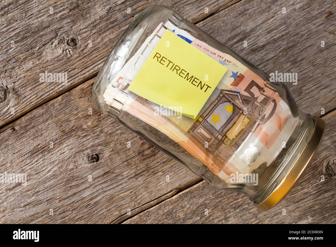 Retirement money jar Stock Photo - Alamy