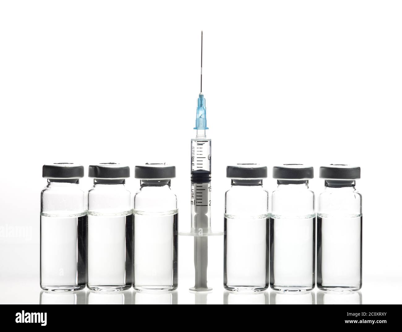 Glass Medicine Vials and Syringe on white background Stock Photo - Alamy