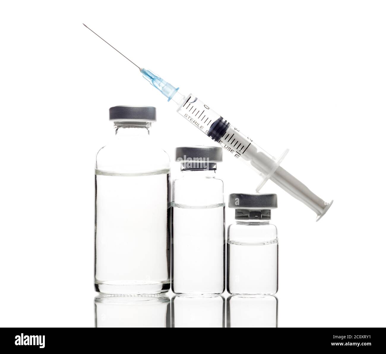 Glass Medicine Vials and Syringe on white background Stock Photo - Alamy