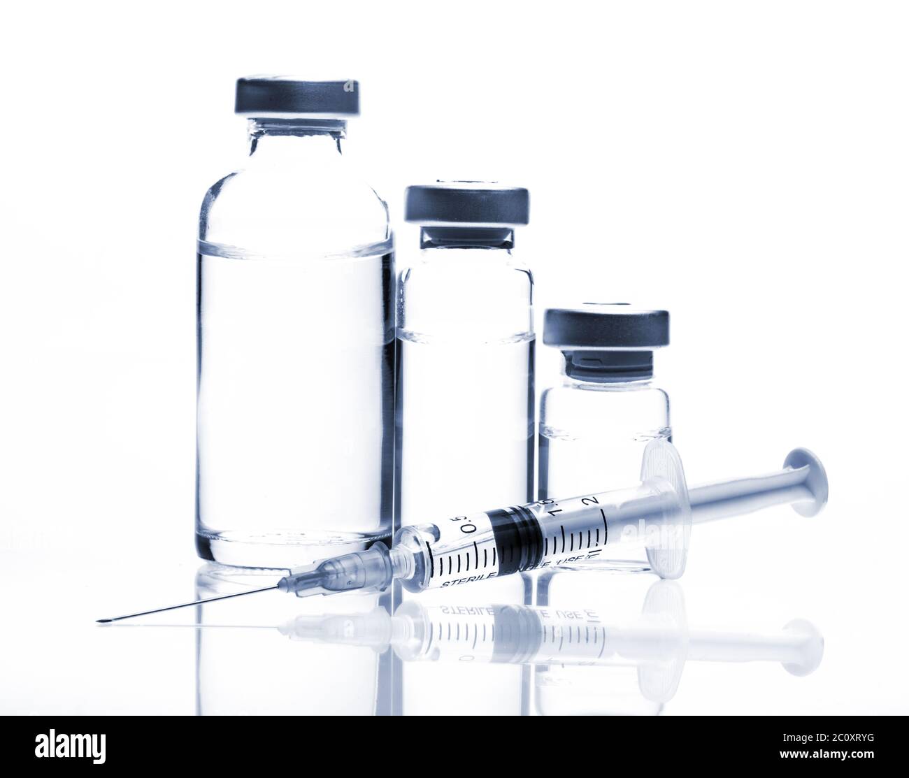 Glass Medicine Vials and Syringe on white background Stock Photo - Alamy