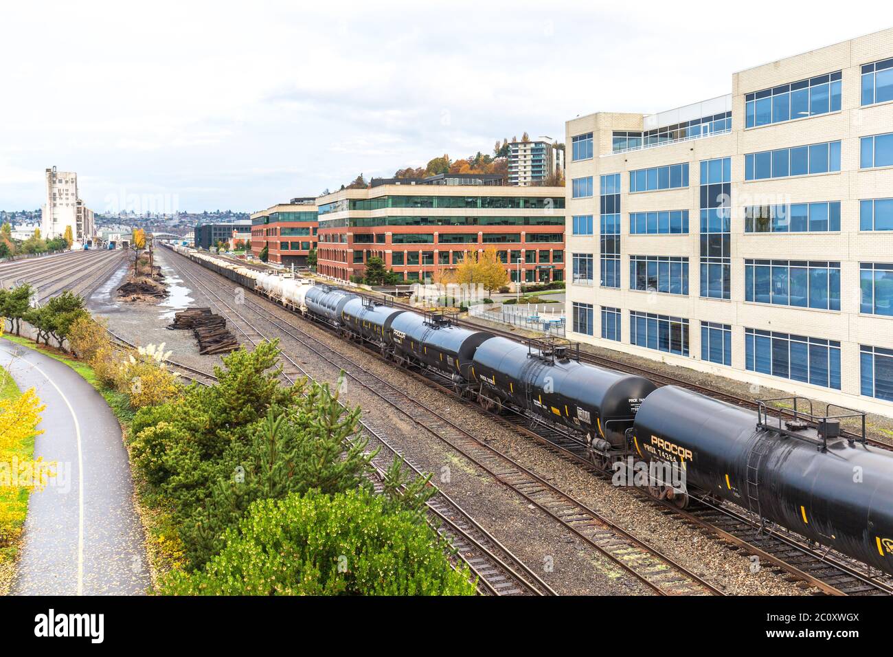 railway with old train near residential buildings Stock Photo - Alamy