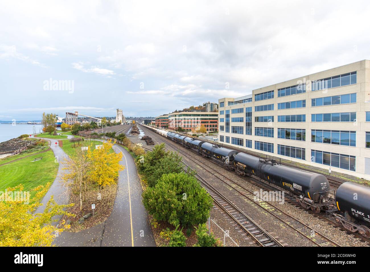 railway with old train near residential buildings Stock Photo - Alamy