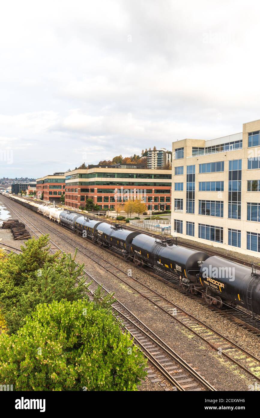 railway with old train near residential buildings Stock Photo - Alamy