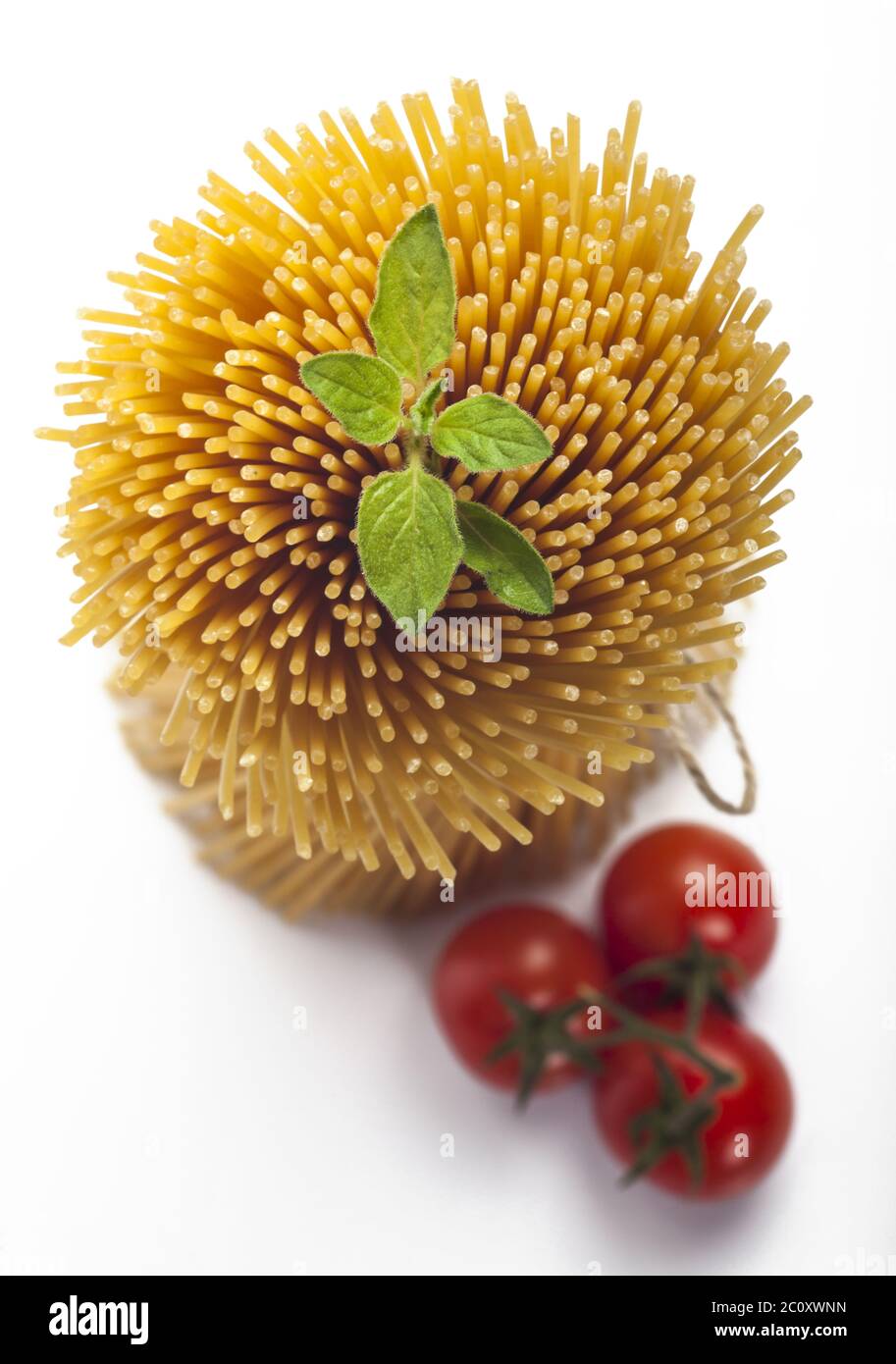 Bunch of spaghetti on white background Stock Photo - Alamy