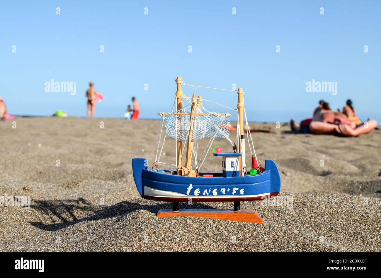Toy Boat on the Sand Beach Stock Photo - Alamy