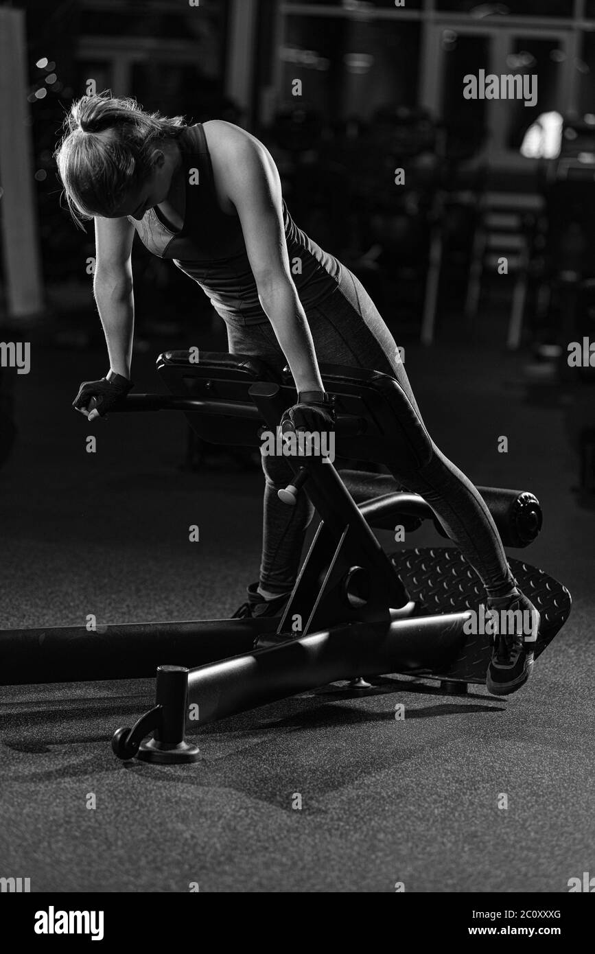 Woman doing strength exercises for abs muscles Stock Photo - Alamy