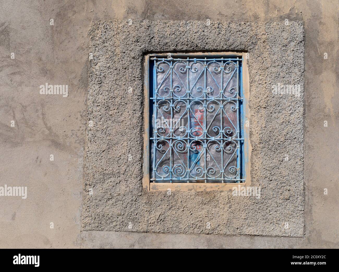 Wrought iron window grilles hi-res stock photography and images - Alamy