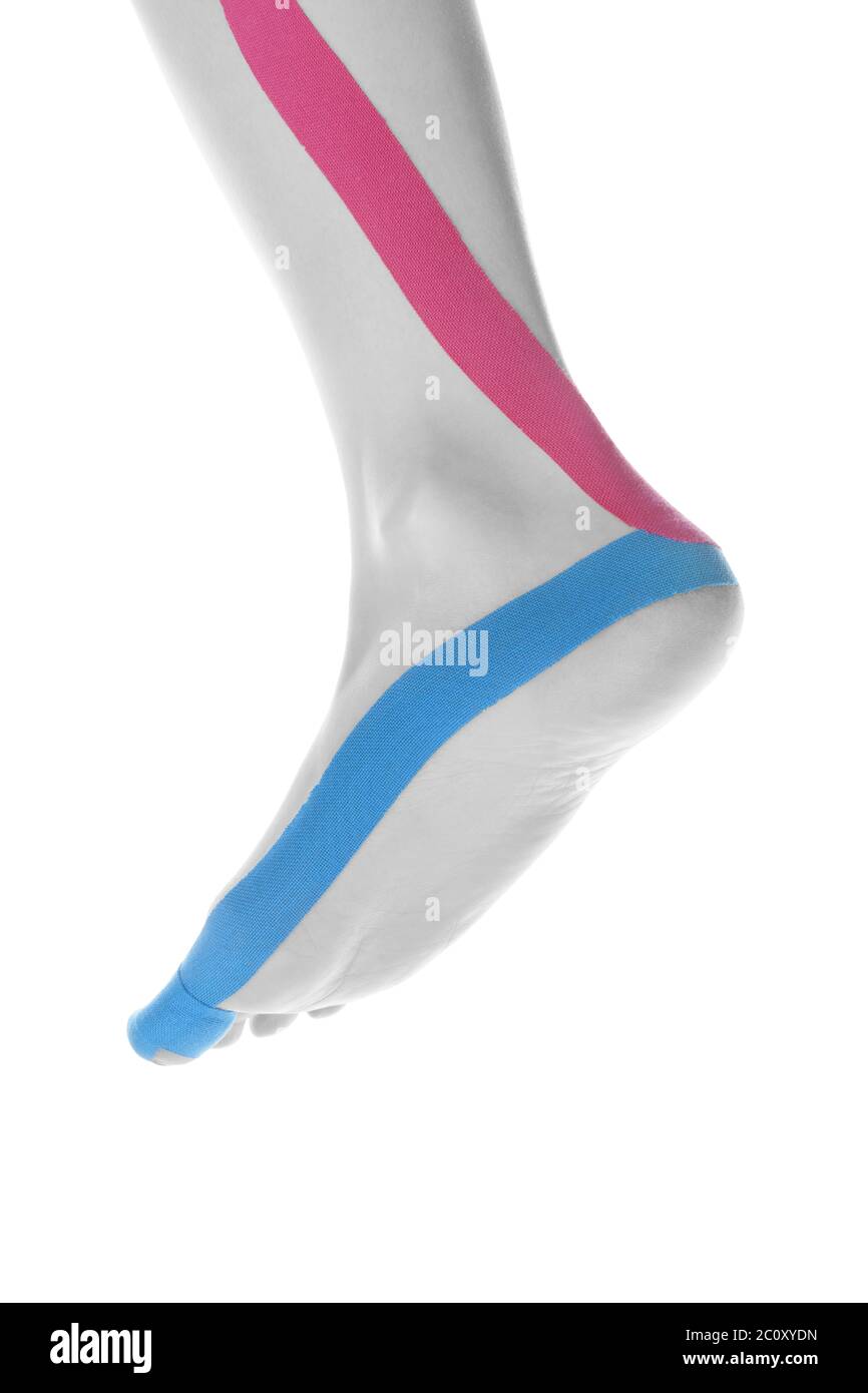 Therapeutic tape on female leg Stock Photo - Alamy