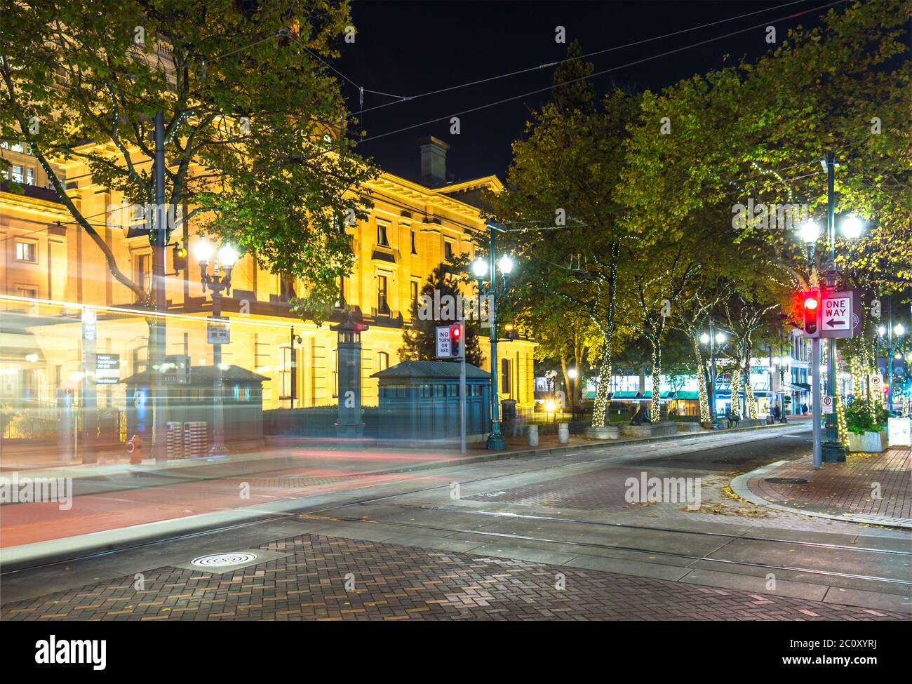 intersection of brick road and modern building Stock Photo - Alamy