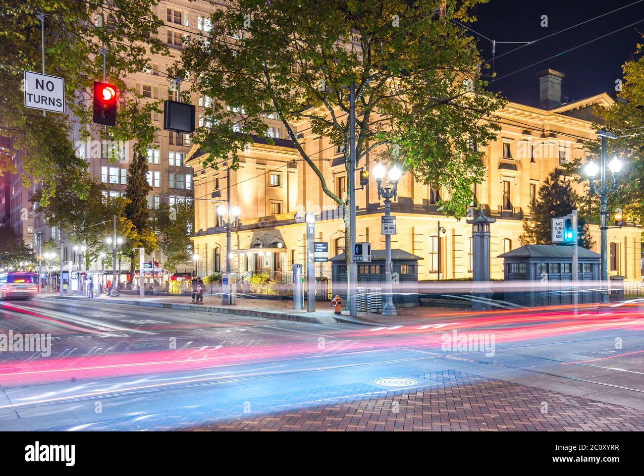 intersection of brick road and modern building Stock Photo - Alamy